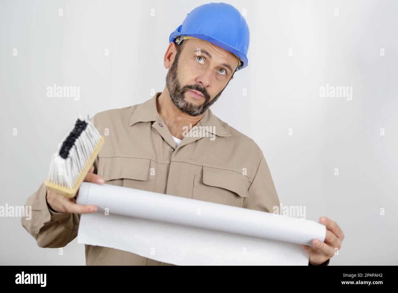 Male construction worker notepad hi-res stock photography and images ...