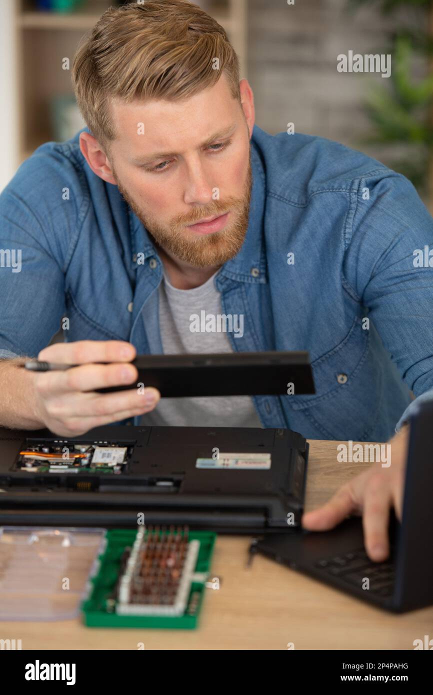 Laptop disassembling screwdriver repair hi-res stock photography and ...