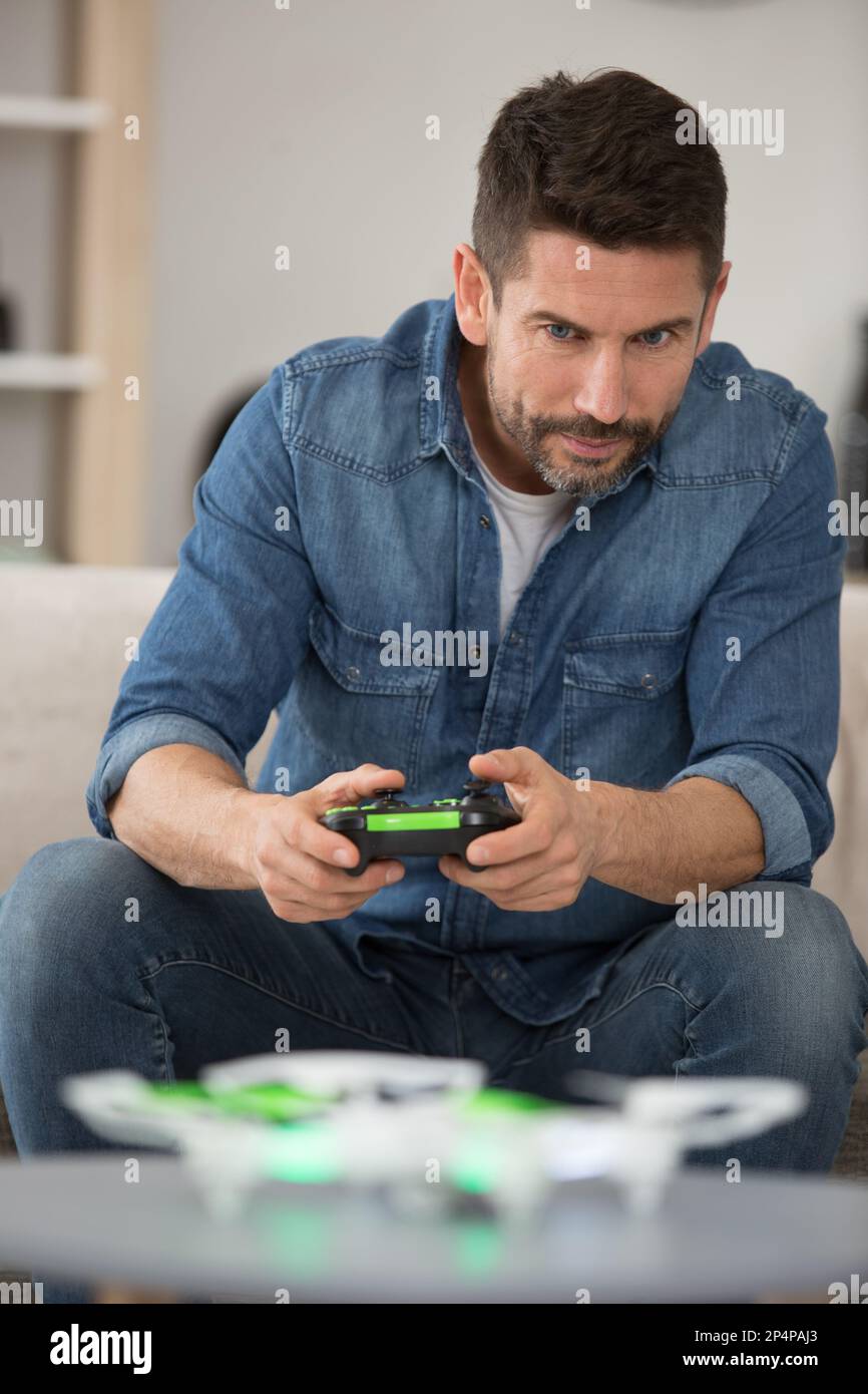 remote control flying drone and flying drone Stock Photo - Alamy