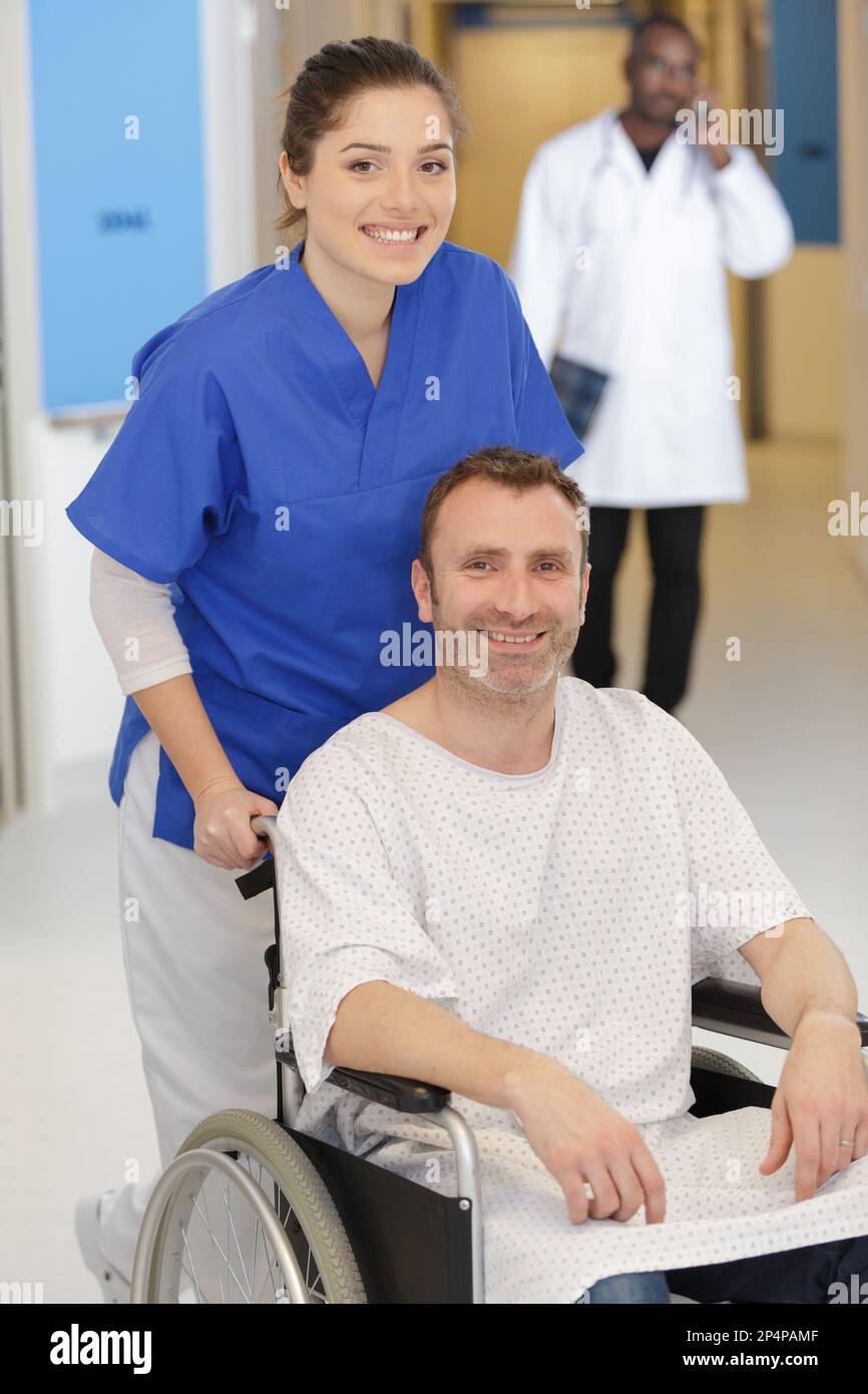Female nurse taking care disabled hi-res stock photography and images ...
