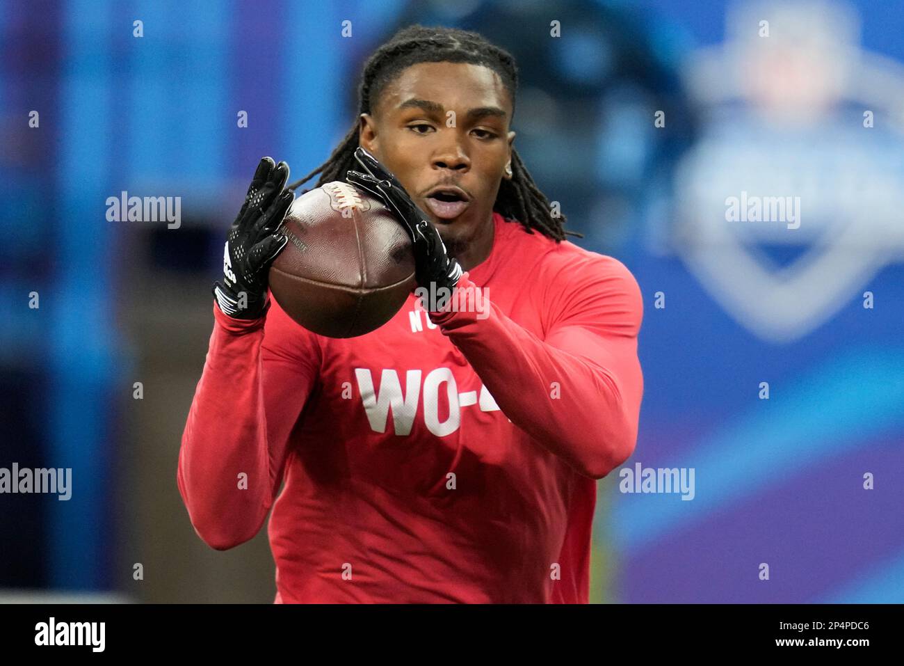 SMU wide receiver Rashee Rice runs a drill at the NFL football scouting ...