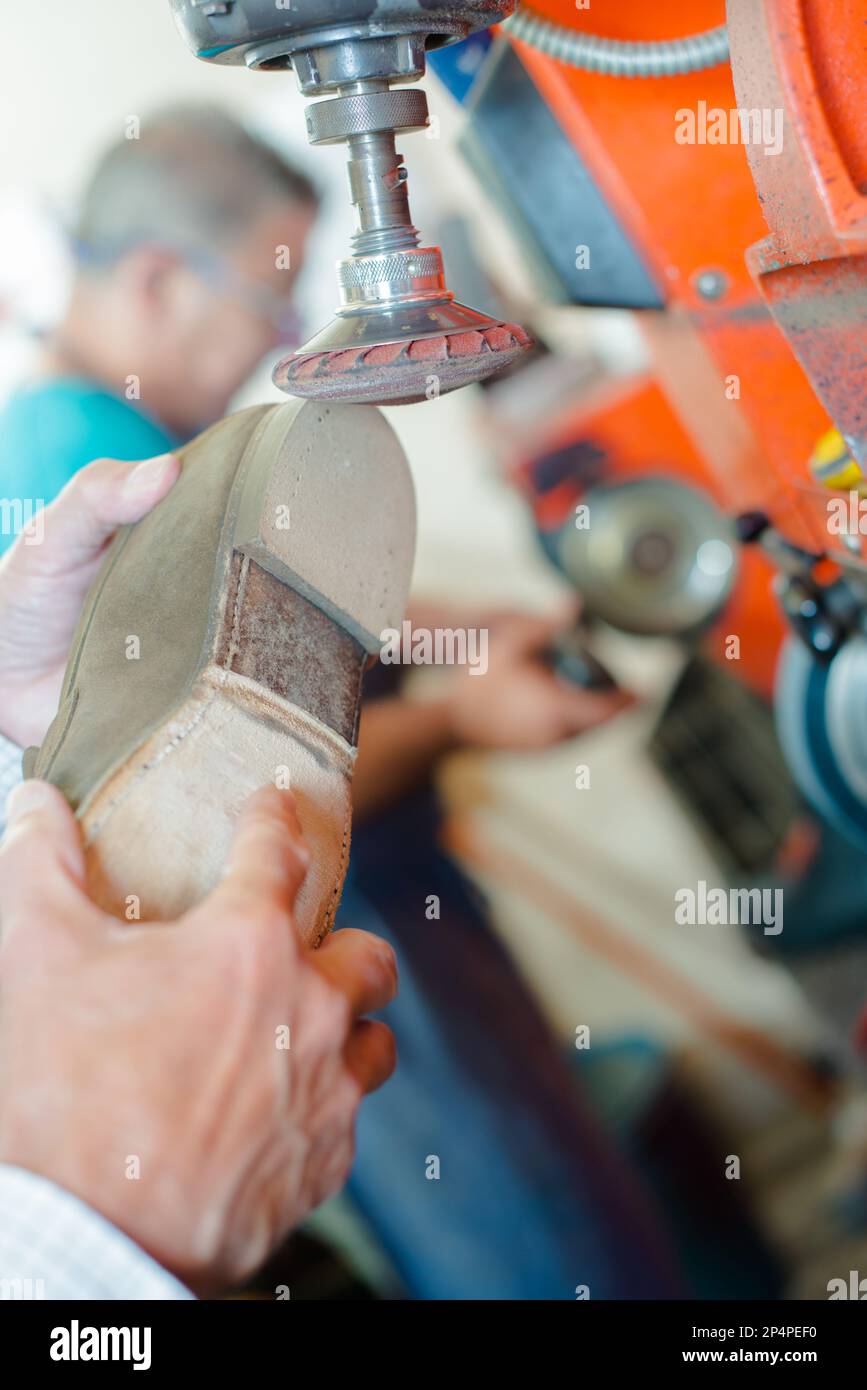 Fixing shoe hi-res stock photography and images - Alamy