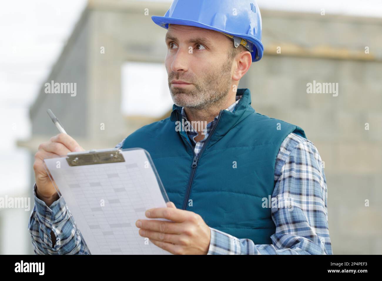 Serious caucasian male contractor inspector hi-res stock photography ...