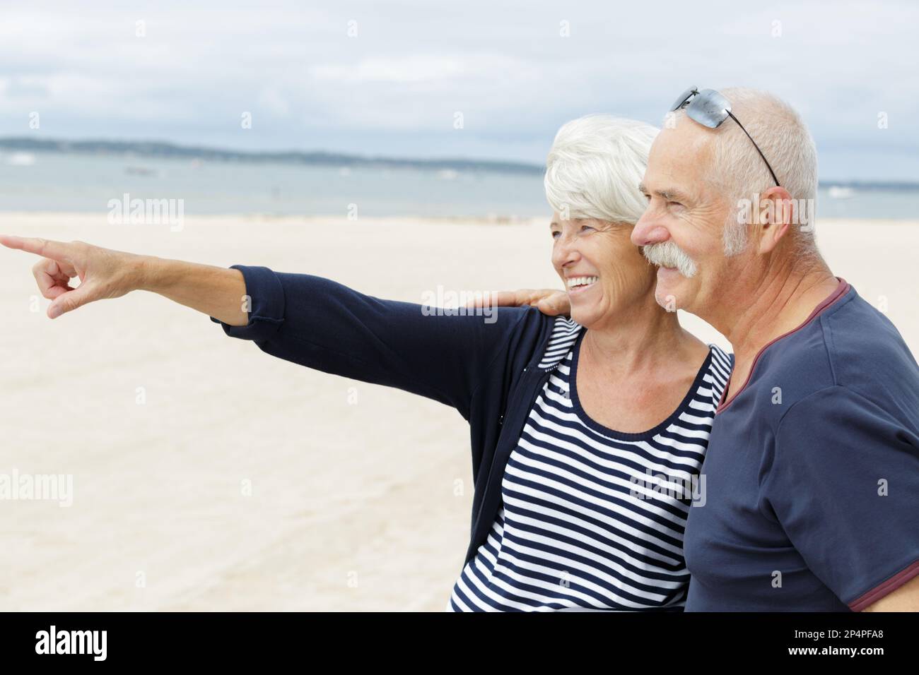a senior couple are at the beach Stock Photo - Alamy
