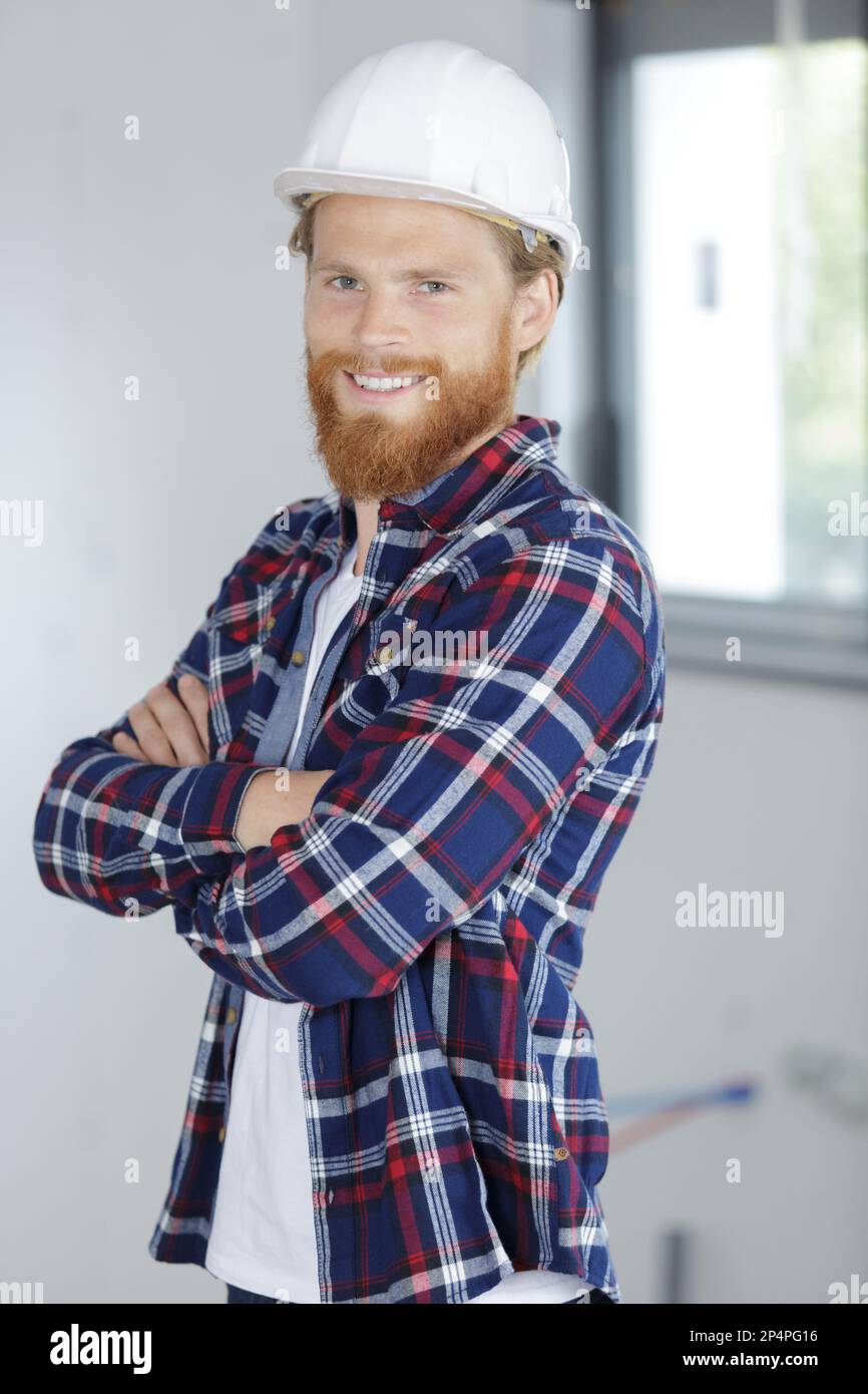 portrait of a bearded builder with his arms crossed Stock Photo - Alamy