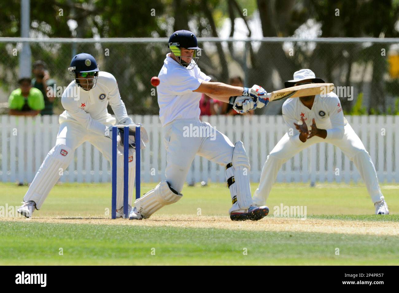 New Zealand XI’s Robbie O’Donnell, right, plays and misses in front of ...