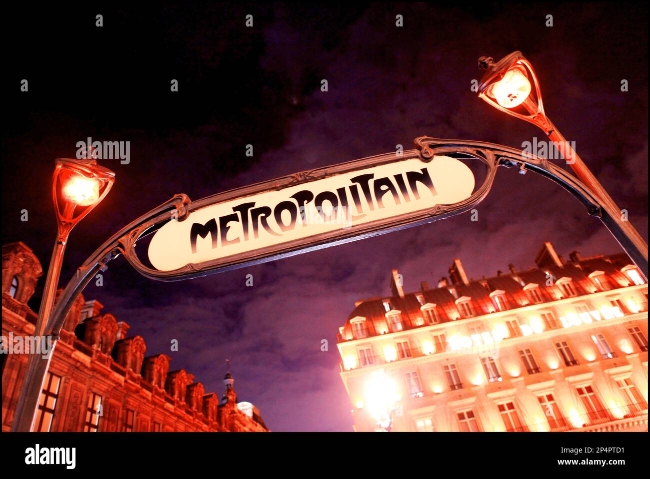 Sign of a metro-subway- station in Paris, France by night. vvbvanbree ...