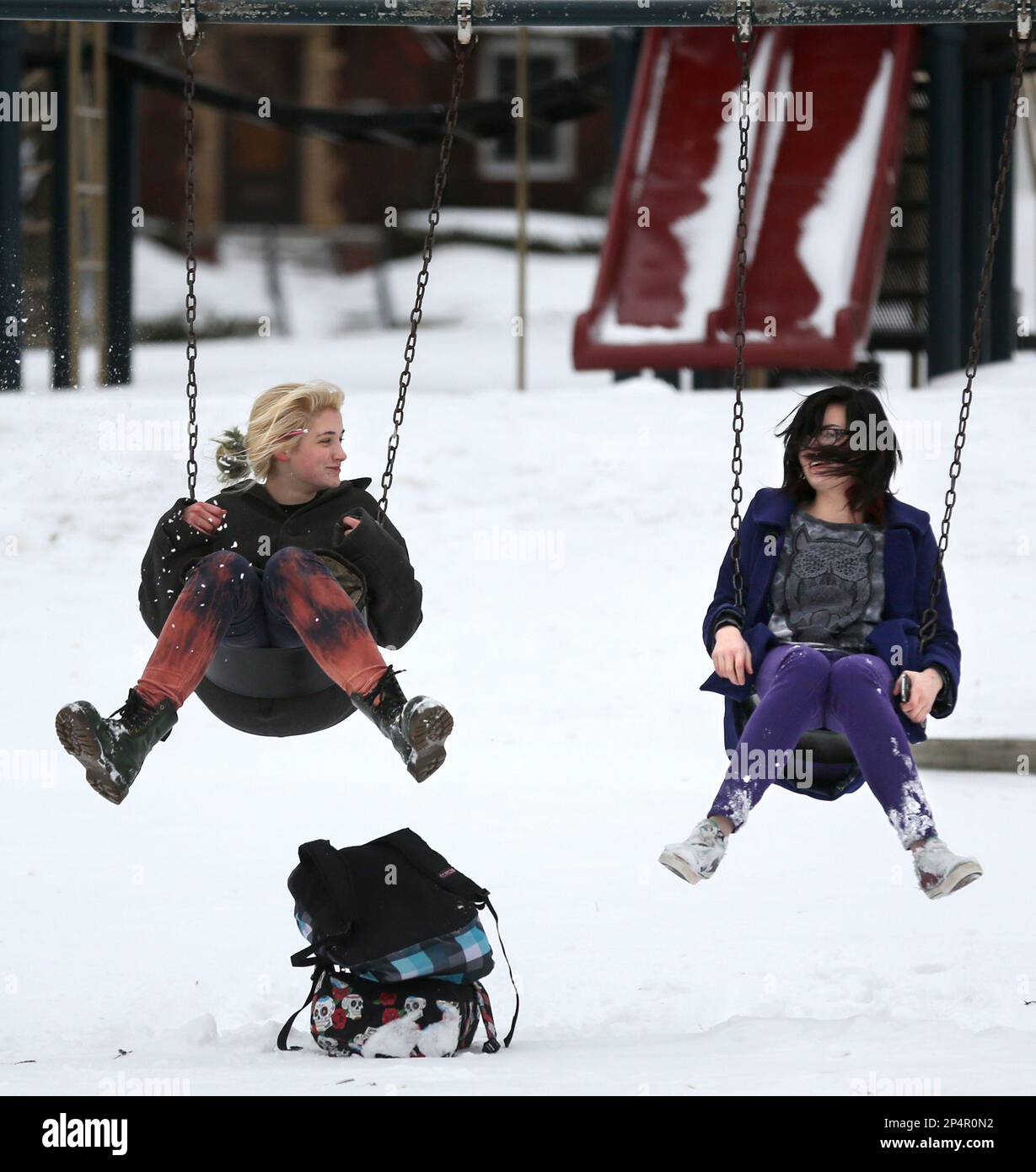Maeve Giafagleone, left, 16, and Becca Schumacher, 16, both of Dubuque ...