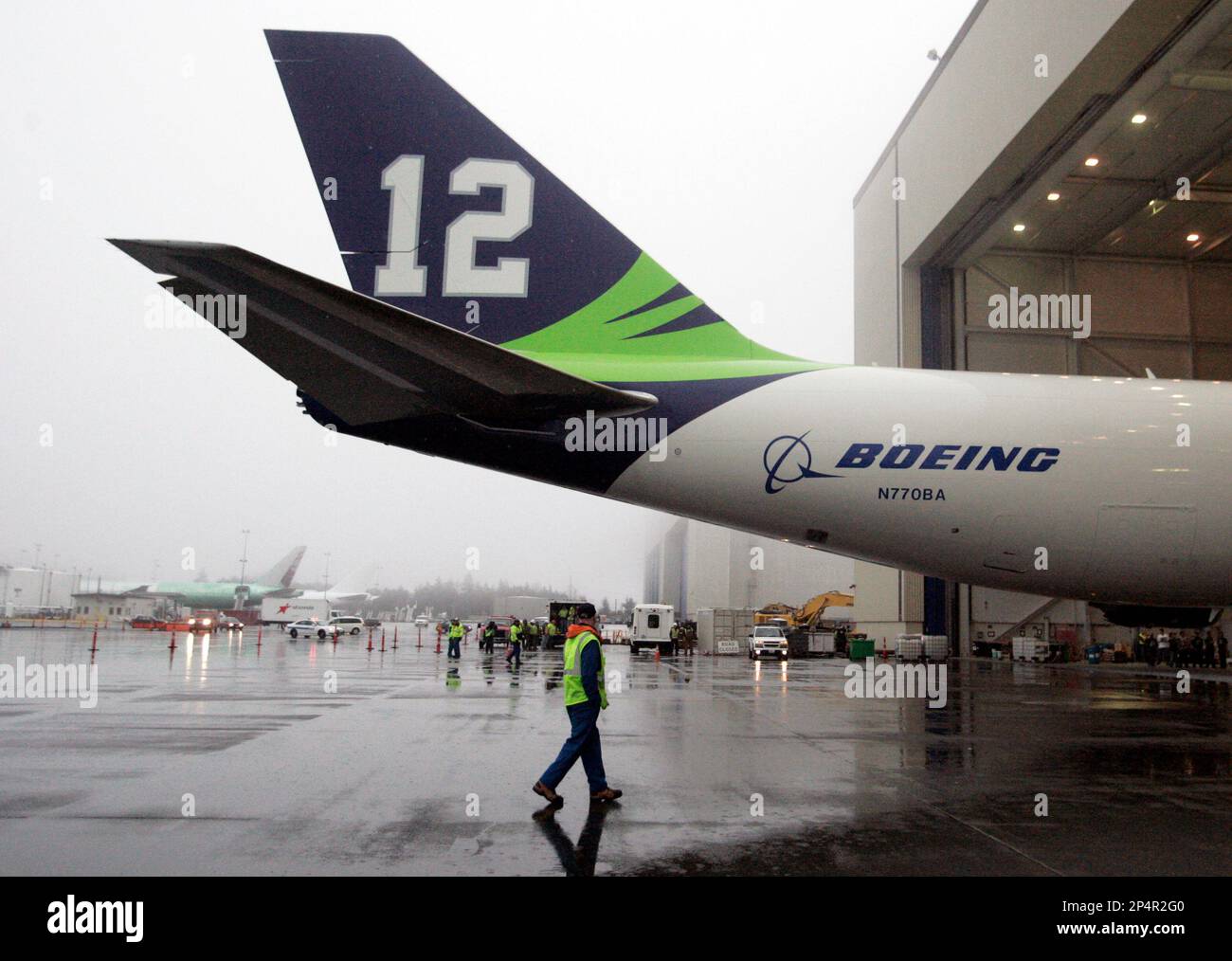 A Boeing 747-8 freighter, painted in Seattle Seahawks livery, is ...