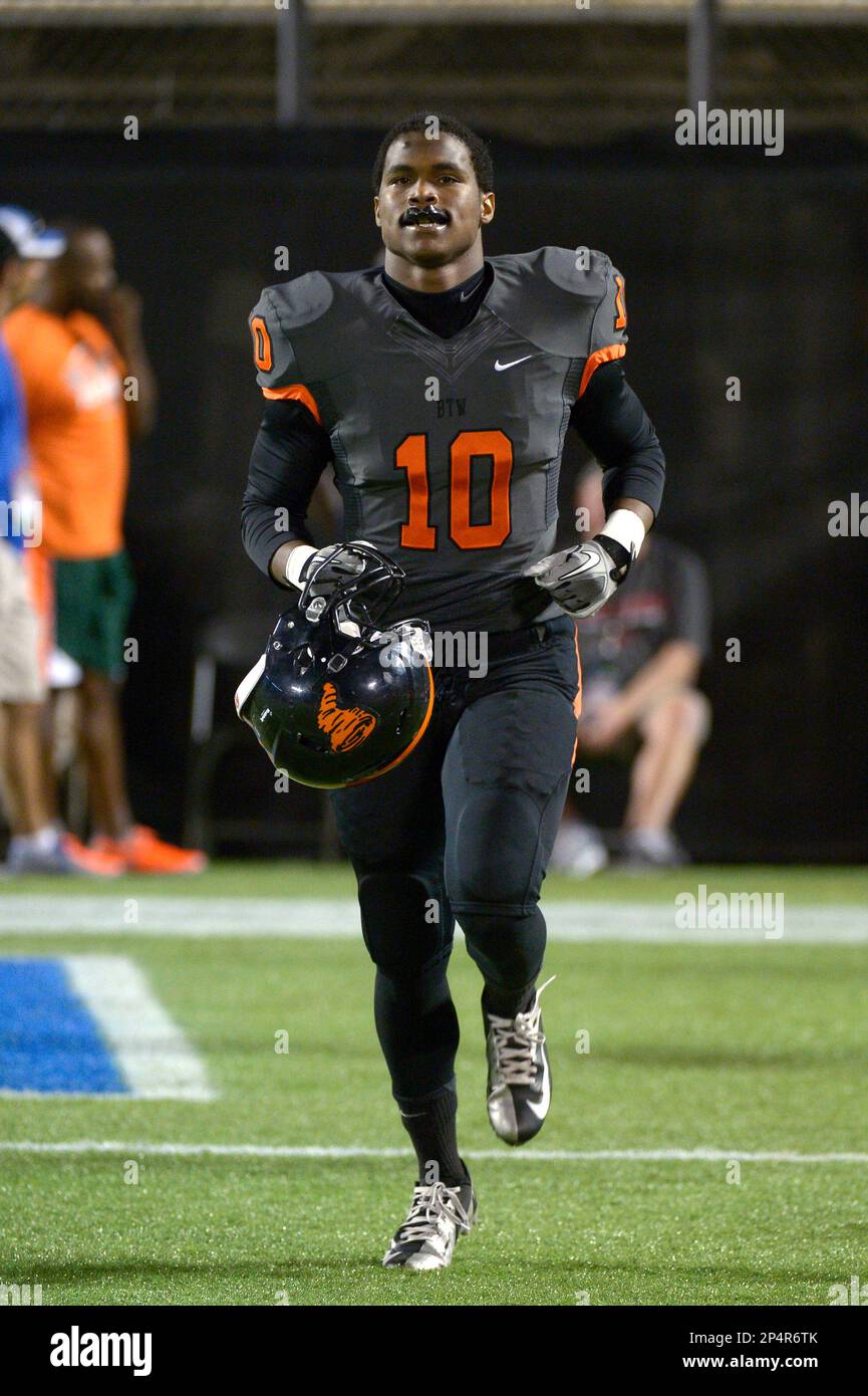 Booker T. Washington linebacker Josh Johnson (10) runs onto the field prior to the Class 4A ...