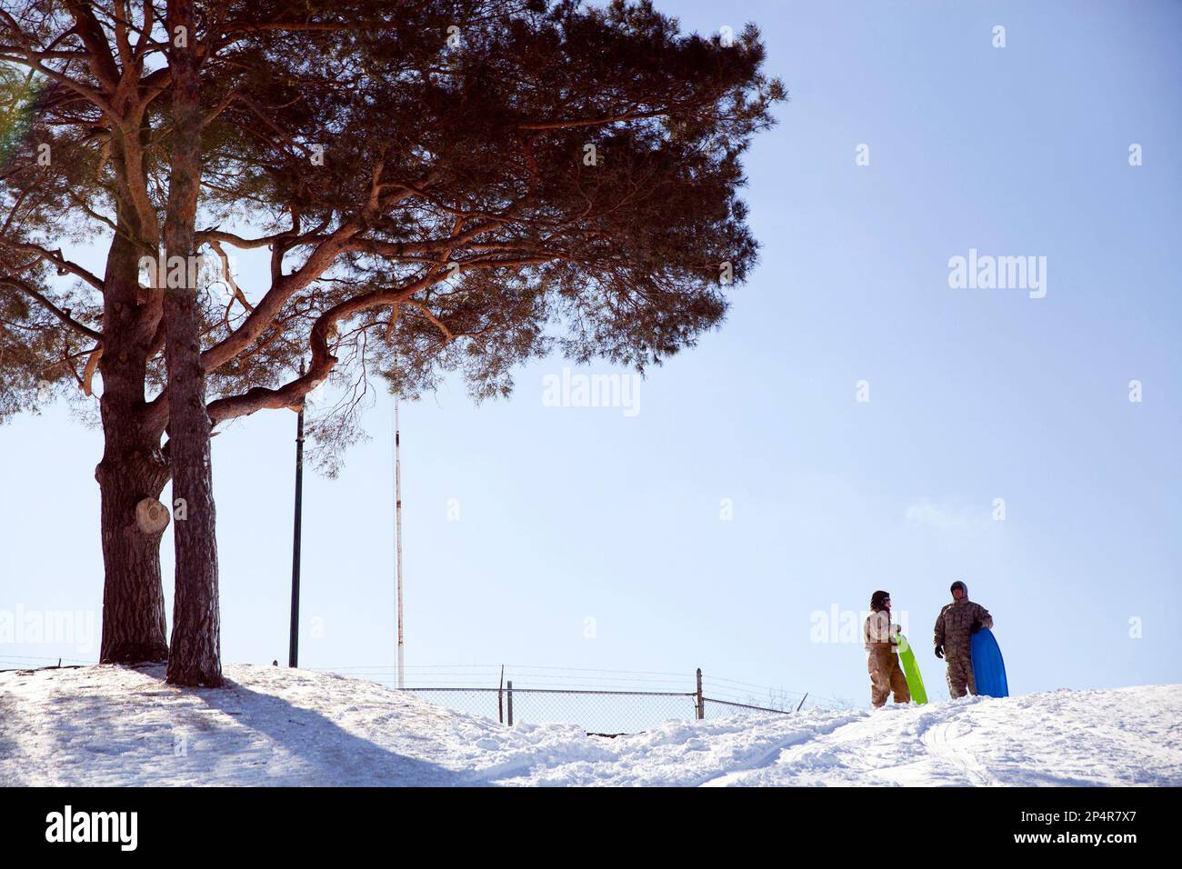 Rachel Peeples, of Nashville, Tenn., prepares to sled down a hill with ...