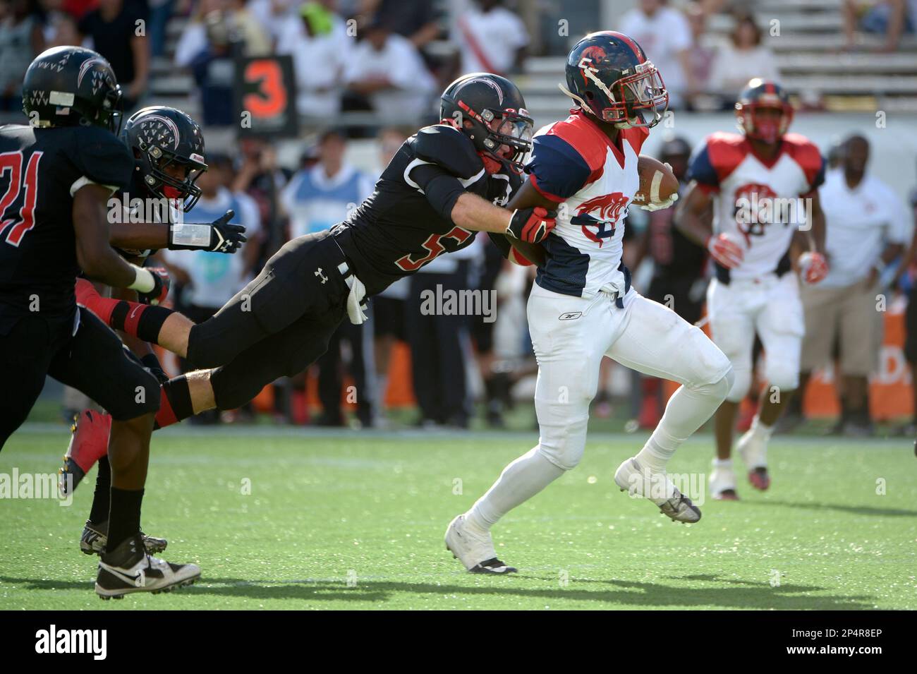Champagnat Catholic quarterback Kato Nelson, second from right ...