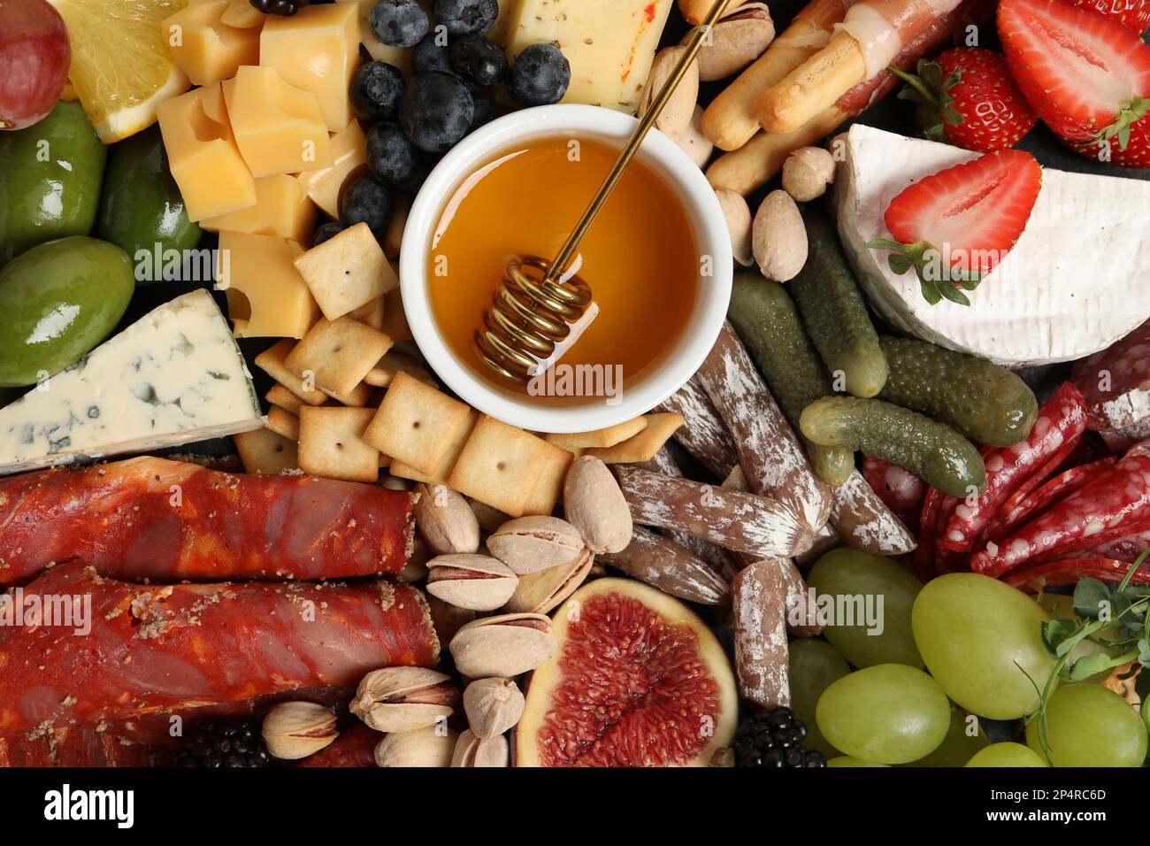 Set of different delicious appetizers as background, top view Stock ...