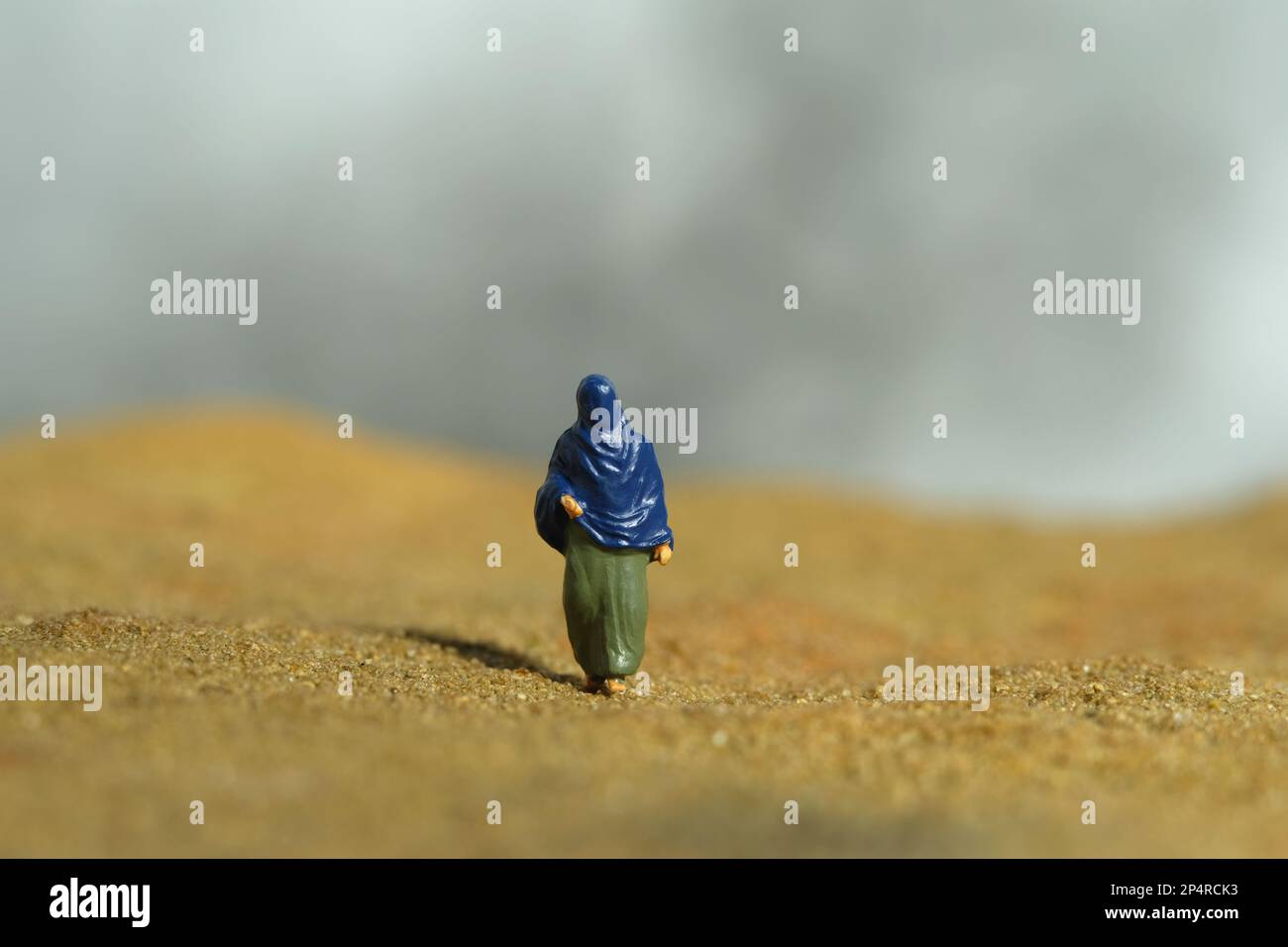 Miniature people toy figure photography. Loneliness and solitude. Women ...