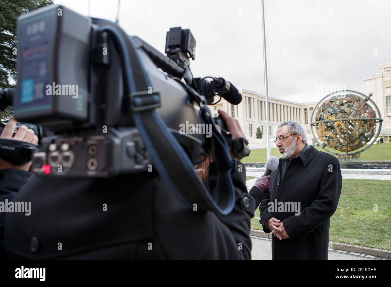 Syrian Information Minister Omran al-Zoubi speaks to the press before a ...