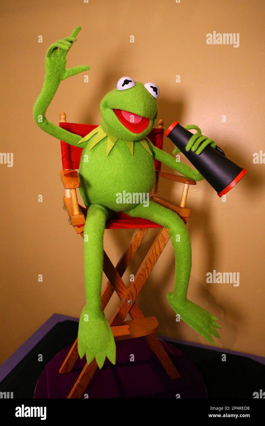 Kermit the Frog sitting in his director's chair is one of the Jim ...
