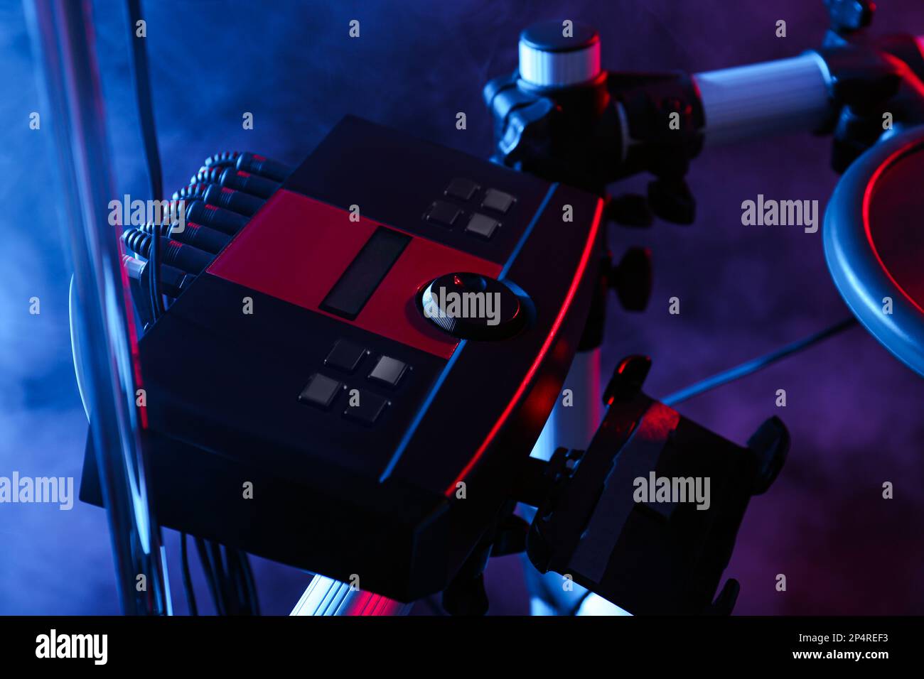 Modern electronic drum module and smoke on dark background. Musical ...