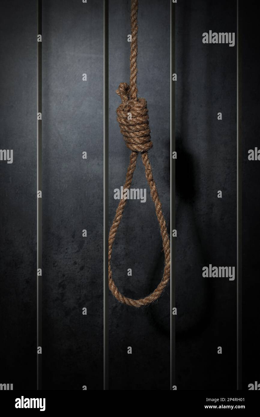 Rope noose with knot in prison cell Stock Photo - Alamy