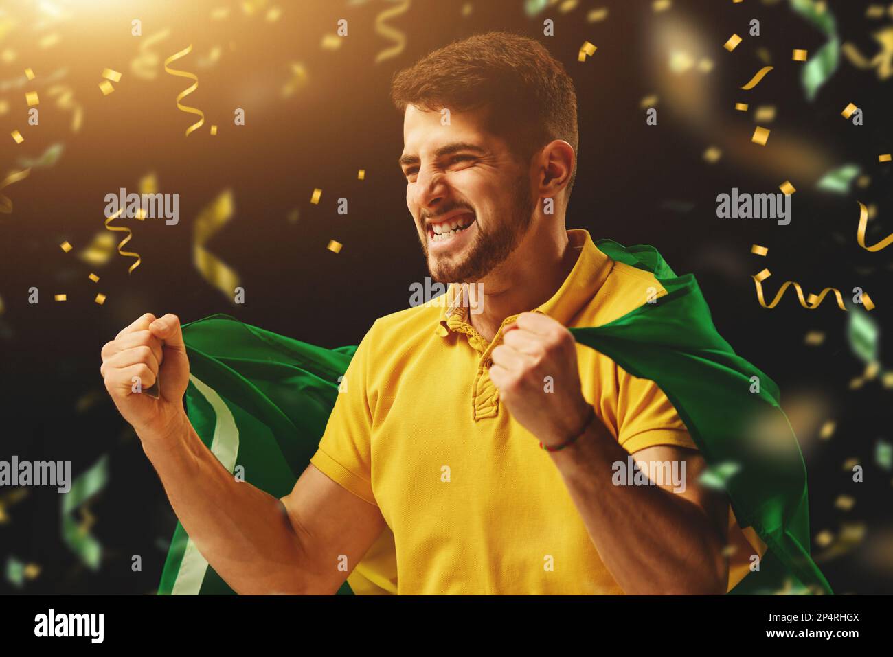 Young emotional man, soccer fan cheering up favorite Brazil football ...