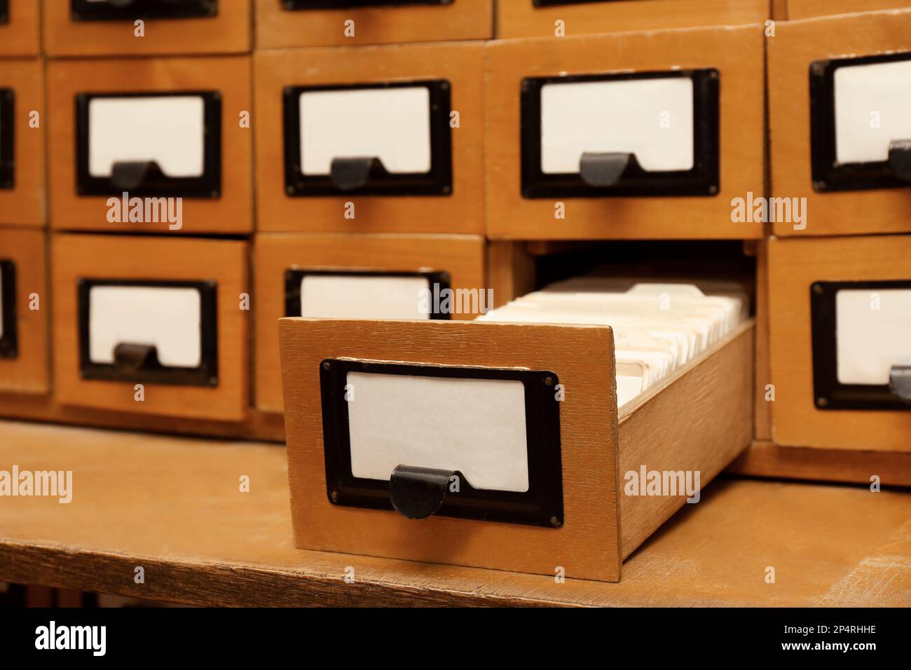 Closeup view of library card catalog drawers Stock Photo - Alamy
