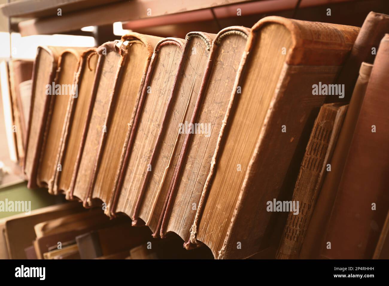 Collection of old books in library, closeup Stock Photo - Alamy