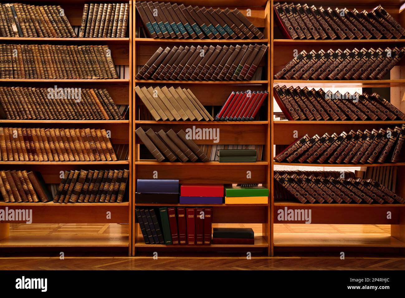Collection of different books on shelves in library Stock Photo - Alamy