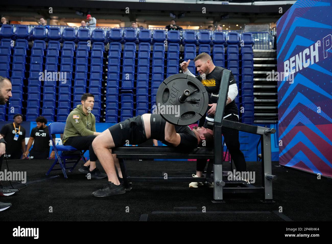 Oregon offensive lineman Alex Forsyth participates in the bench press ...