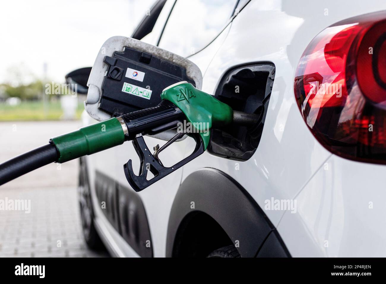 Driver refueling car hi-res stock photography and images - Alamy