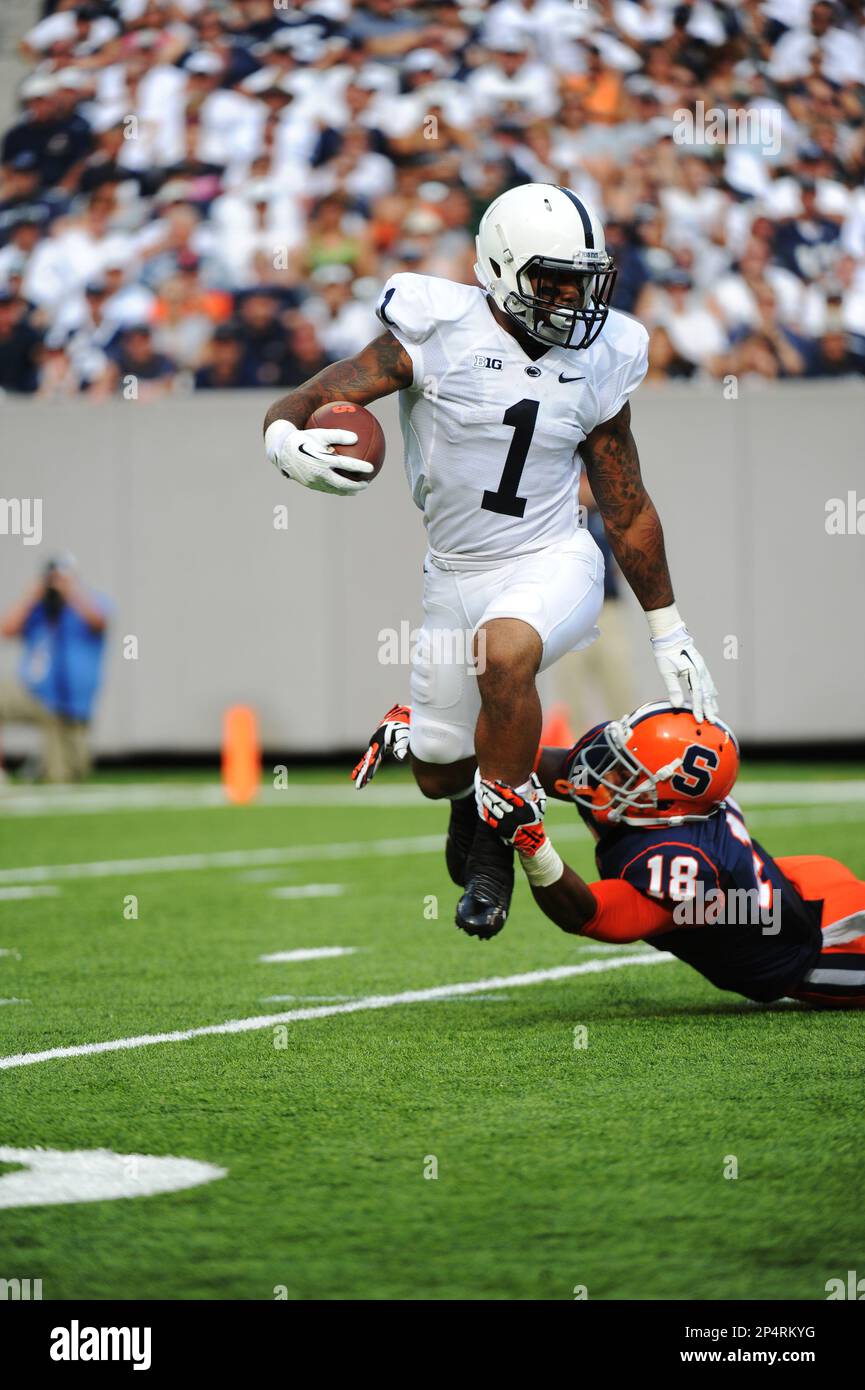 Penn State University Nitty Lions runningback Bill Benton (1) tries to ...