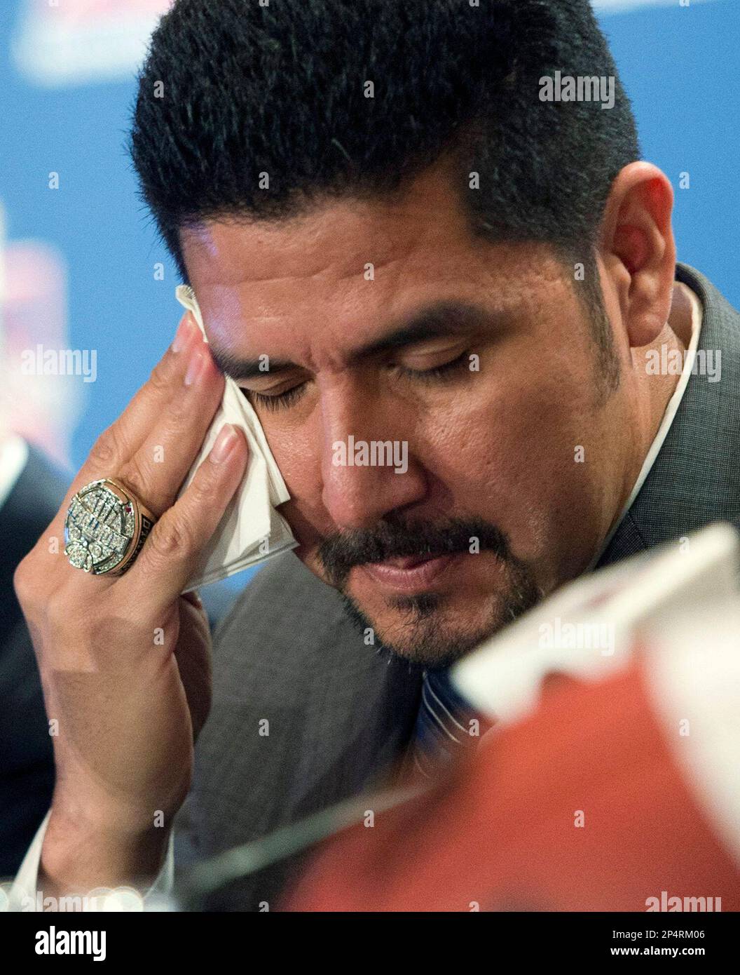 Montreal Alouettes quarterback Anthony Calvillo wipes his eye during a ...
