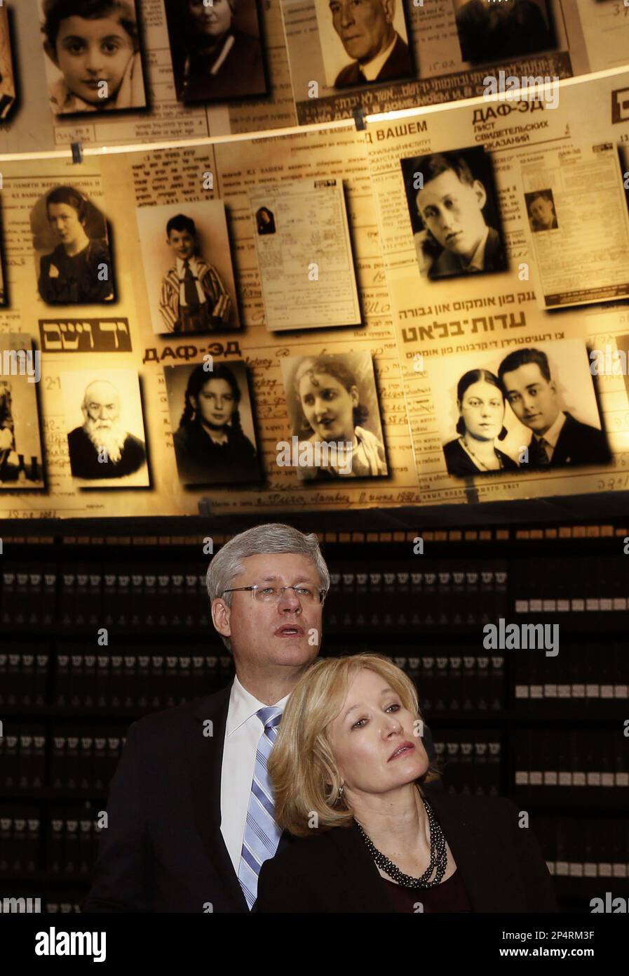 Canadian Prime Minister Stephen Harper and his wife Laureen look at ...