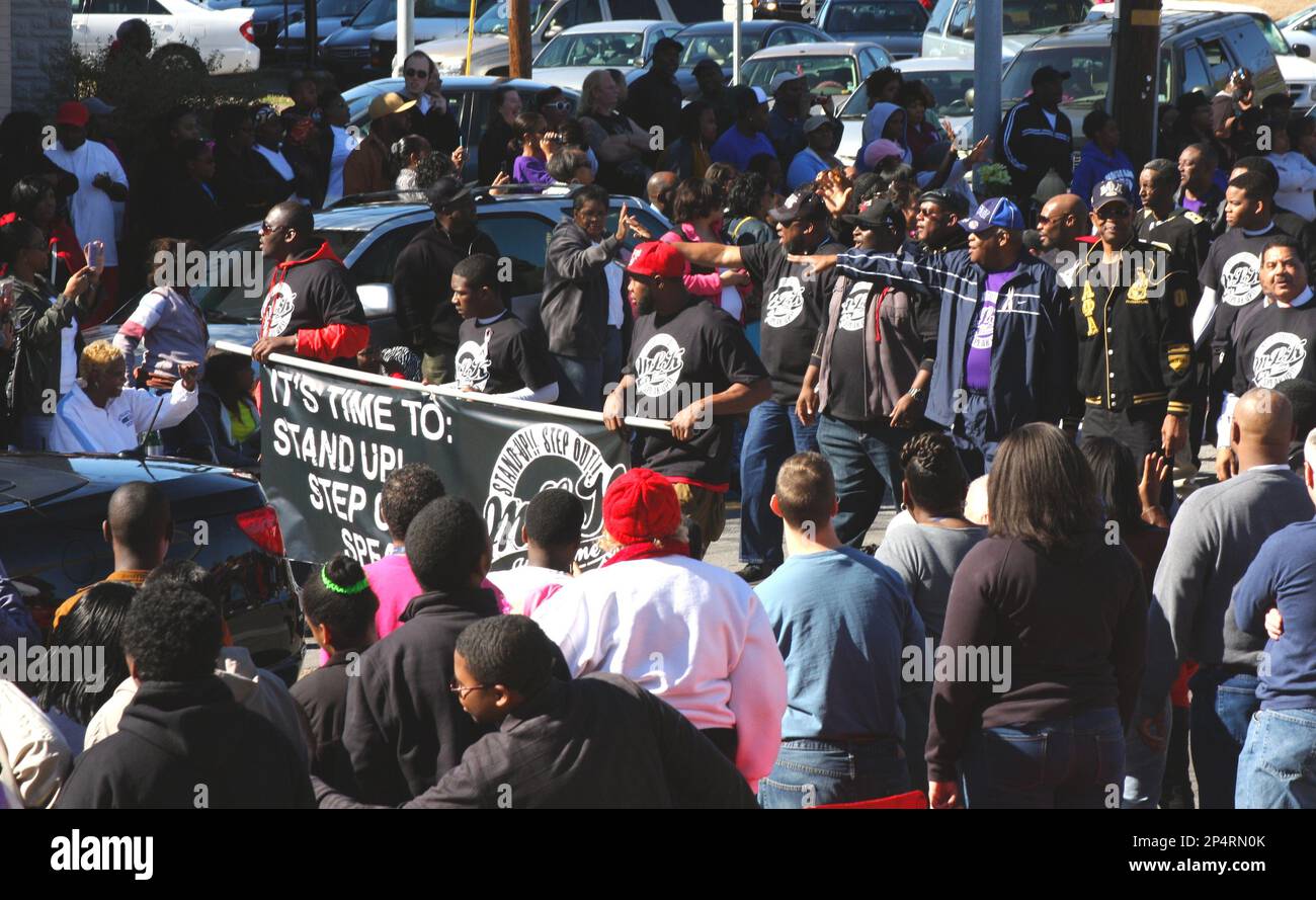 Throngs of people line the street for the Rev. Martin Luther King Jr ...