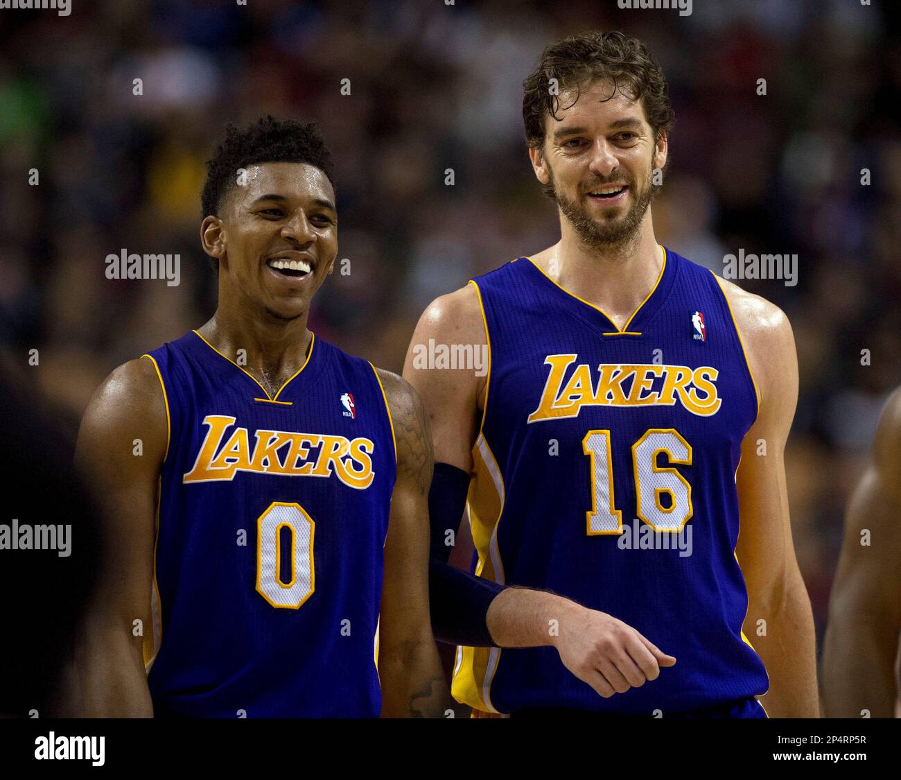 Los Angeles Lakers center Pau Gasol (16) and guard Nick Young (0) smile ...
