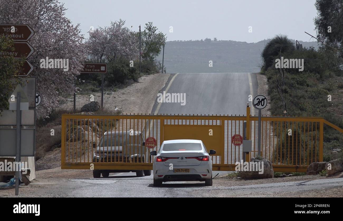 GIVAT HAREL, ISRAEL - MARCH 5: Cars drive through the electronic gate ...