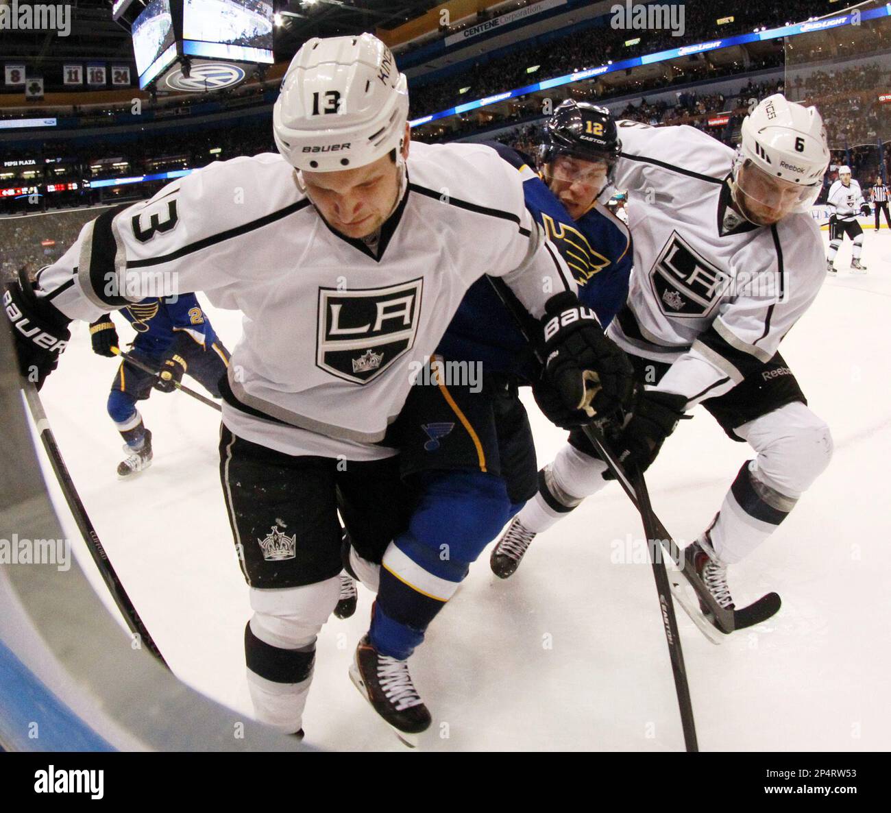St. Louis Blues center Derek Roy (12) is sandwiched between Los Angeles ...