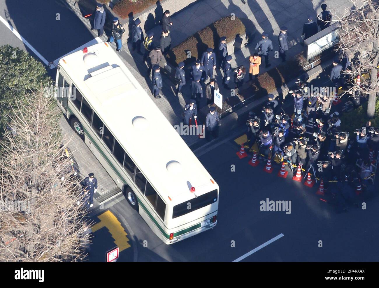 A photo shows a prison bus, which is believed to carry Makoto Hirata, a ...
