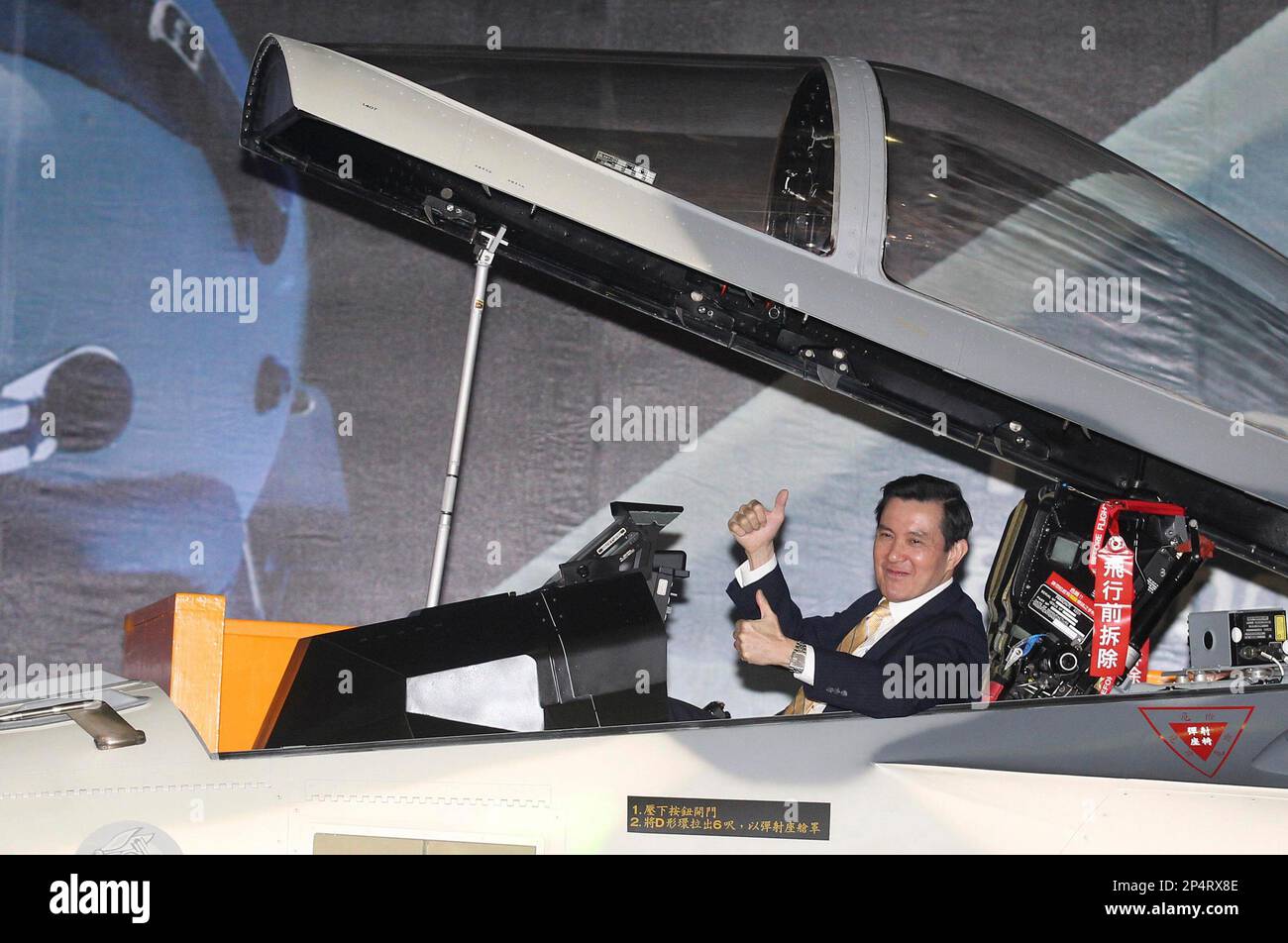 Taiwan's President Ma ying-jeou poses in a cockpit of an upgraded ...