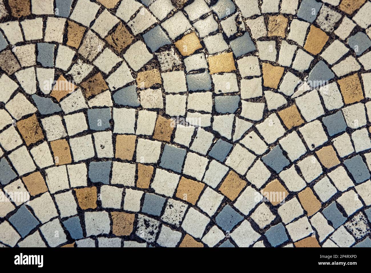 Vintage mosaic flooring fragment. Small squares in white, blue and ...