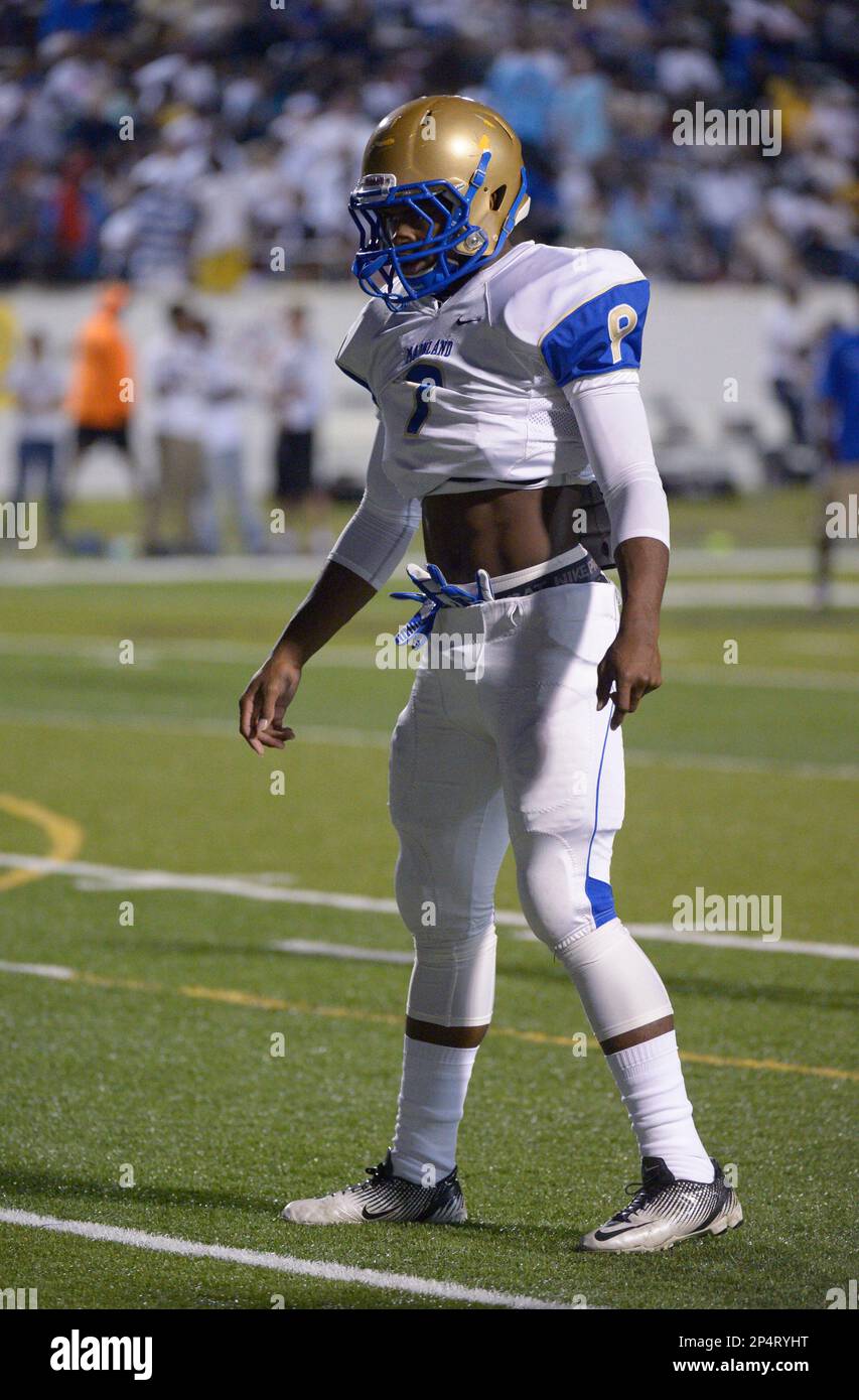 Mainland's Kalik Williams (9) warms up prior to a high school football ...