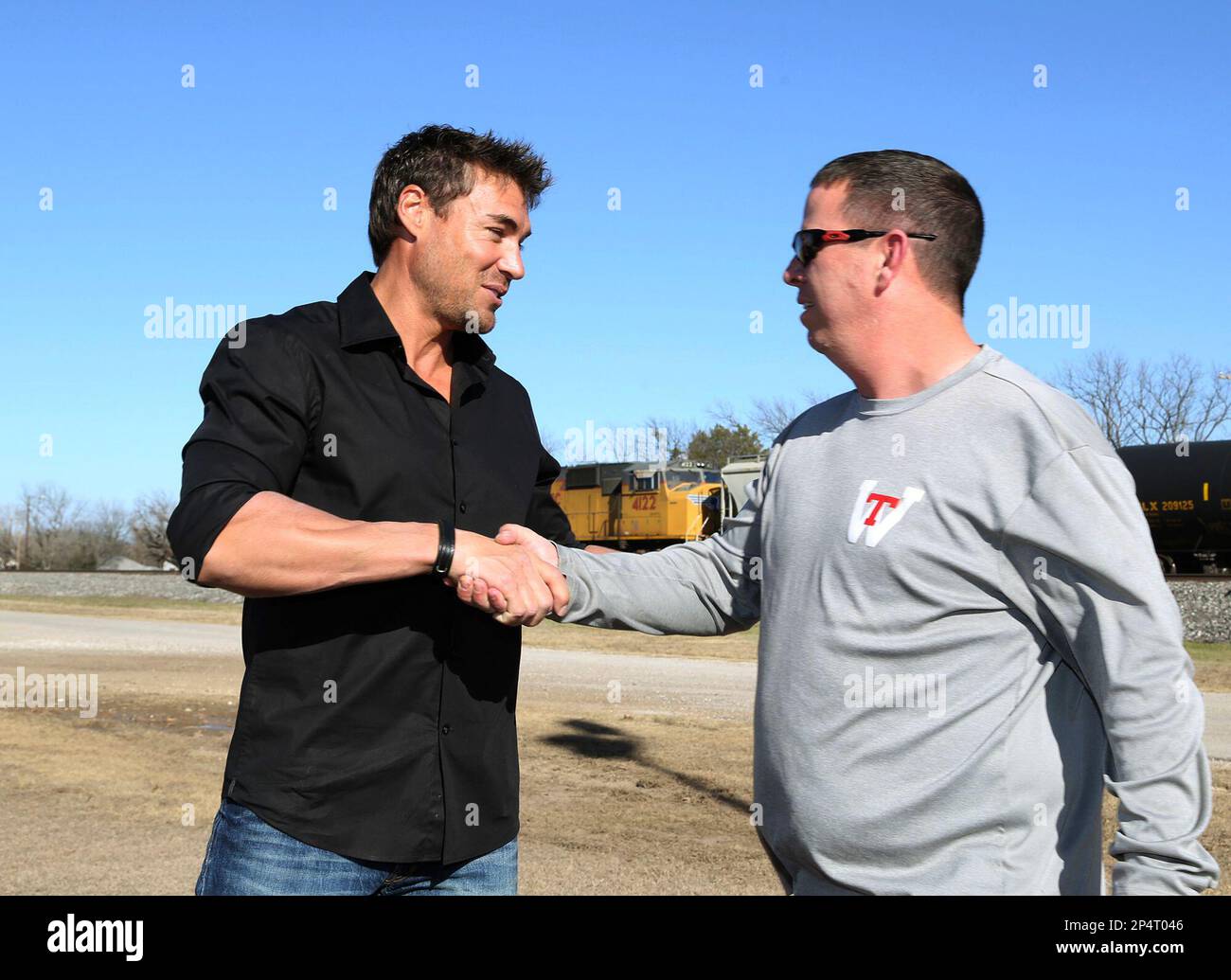 Former major league baseball player Scott Podsednik, left, shakes hand ...