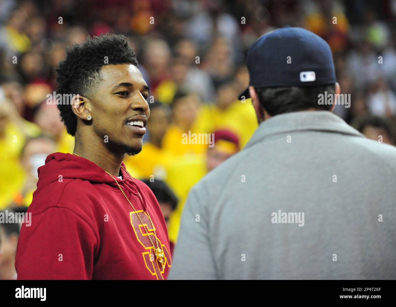 January 12, 2014: Matt Leinart chats with Nick Young of the Lakers ...