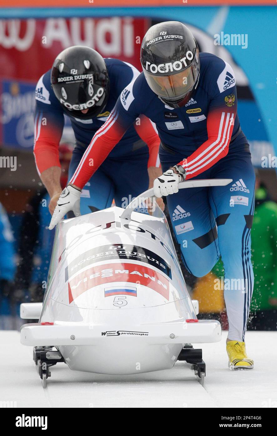 Alexander Zubkov and Alexey Voevoda from Russia start during the men's ...