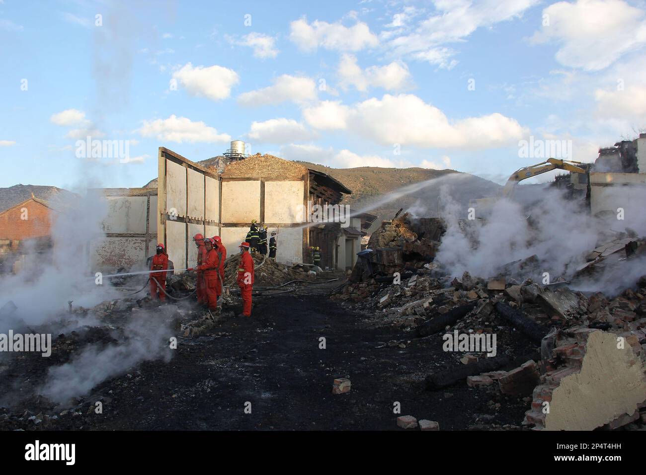Firefighters put out a fire that ravages ancient Dukezong town in ...
