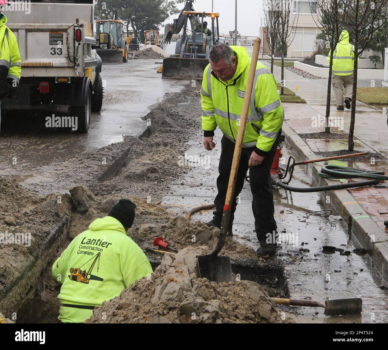 John Conner, public works supervisor for the City of Ventnor, right ...