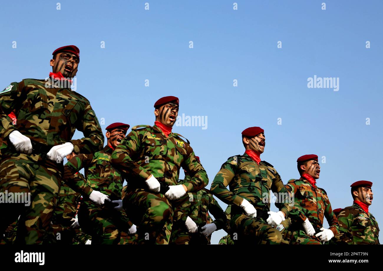 Iraqi police commandos unit march during a ceremony marking Police Day ...