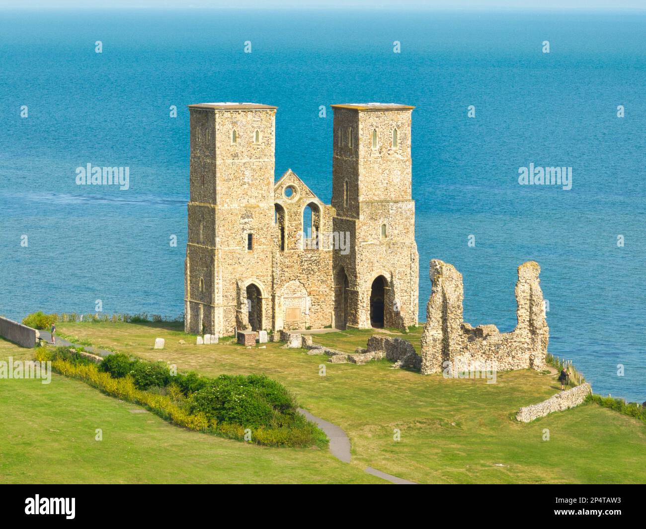 The Reculver Towers and Roman Fort on the seaside in Reculver, England ...