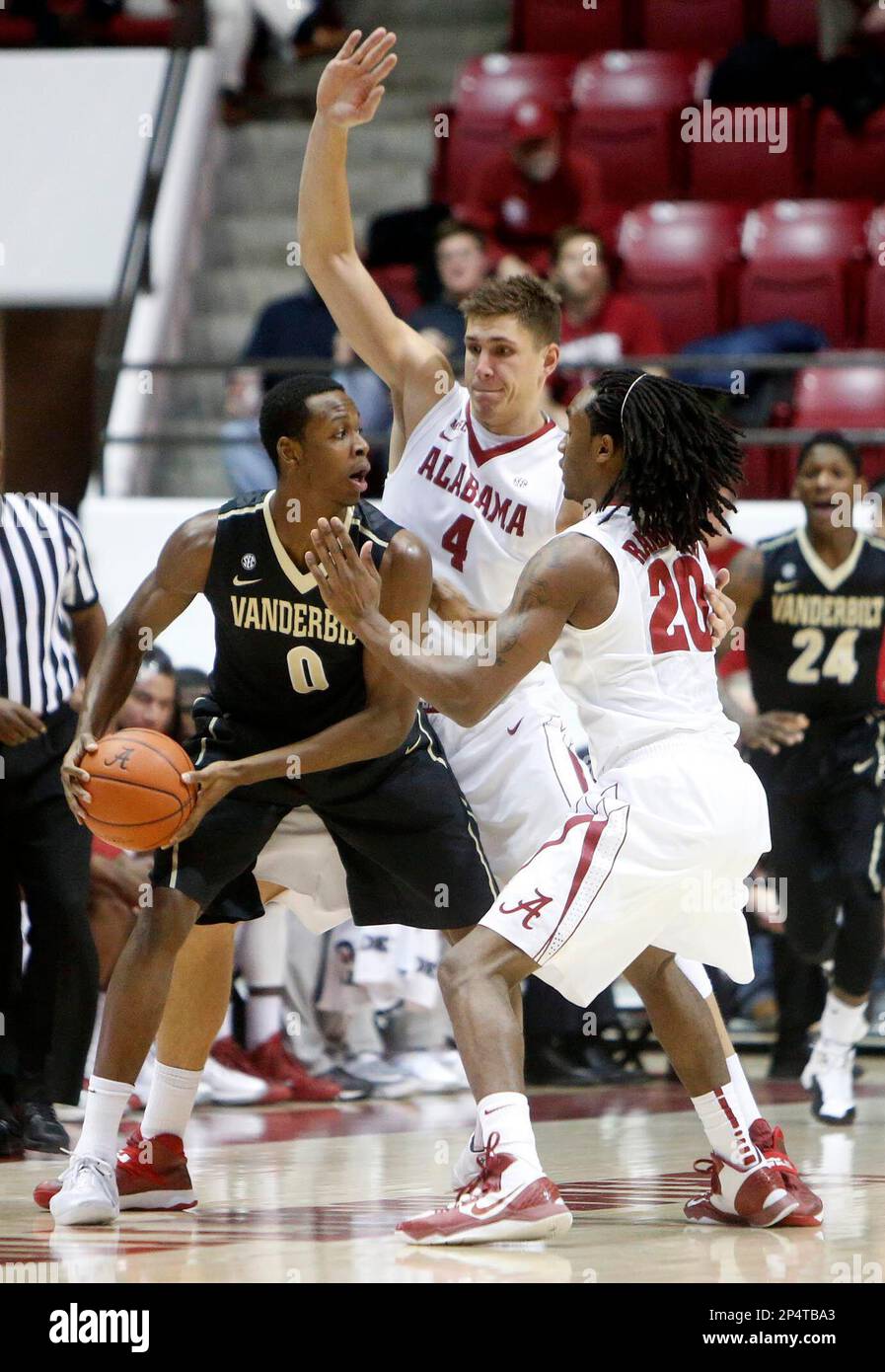 Alabama's Carl Engstrom (4) and Levi Randolph (20) pressure Vanderbilt ...