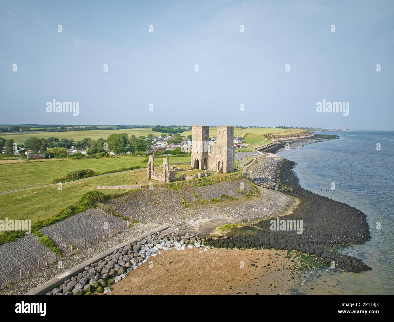 The Reculver Towers and Roman Fort on the seaside in Reculver, England ...