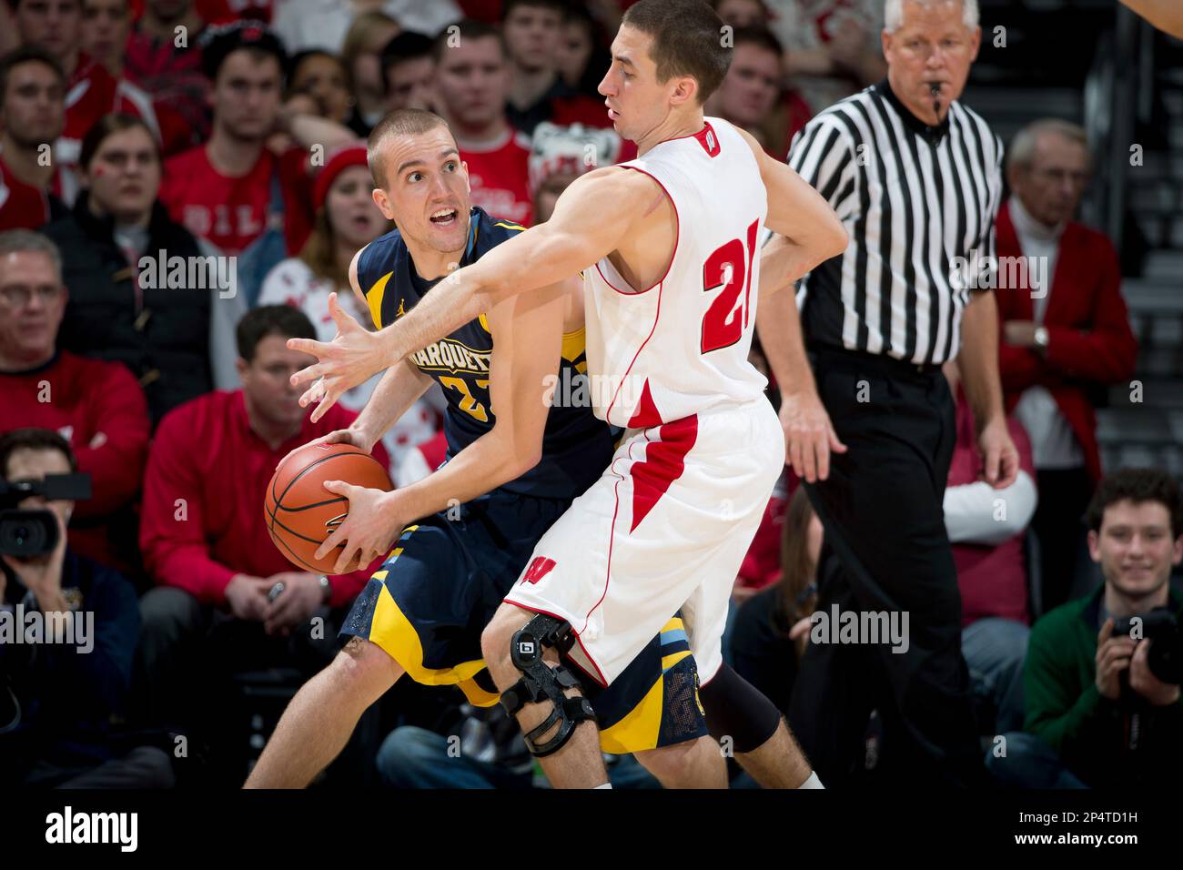 Wisconsin Badgers guard Josh Gasser (21) defends against Marquette ...