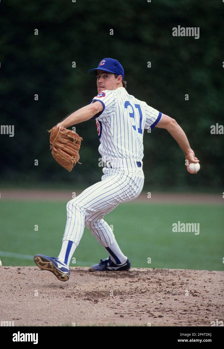 Chicago Cubs pitcher Greg Maddux pitches during a game. Circa Braves (86-92) (AP Photo/Tom ...